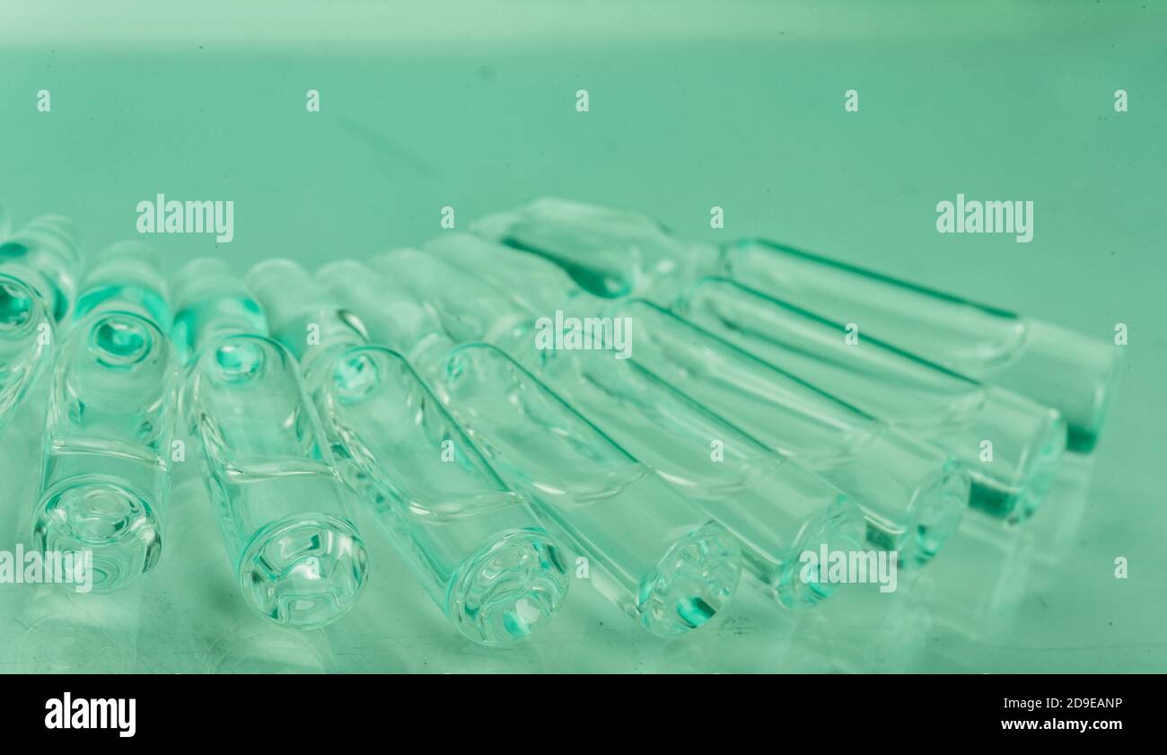 Glass medical ampoule vial for injection. Medicine is liquid sodium ...