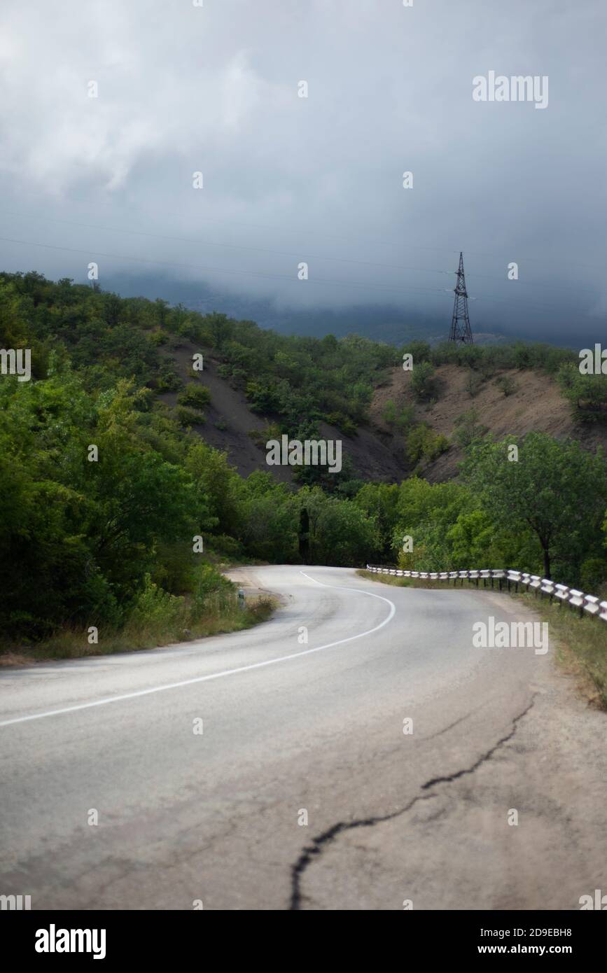Highlands road. Power lines on the mountains Stock Photo - Alamy