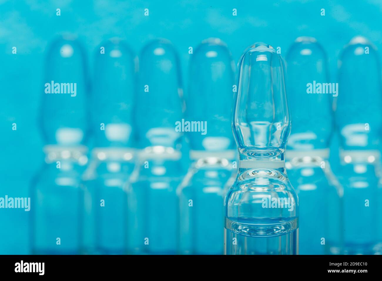Glass medical ampoule vial for injection. Medicine is liquid sodium ...