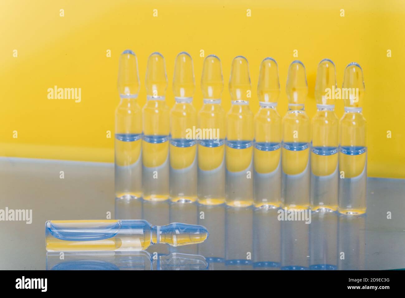 Glass medical ampoule vial for injection. Medicine is liquid sodium ...