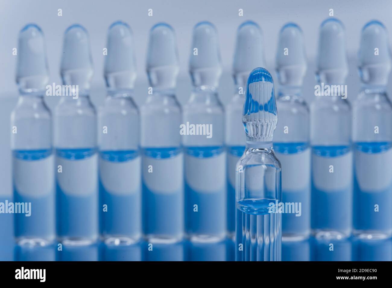 Glass medical ampoule vial for injection. Medicine is liquid sodium ...