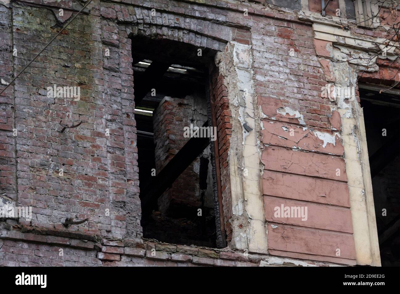 Broken windows in an old abandoned building about to be demolished ...