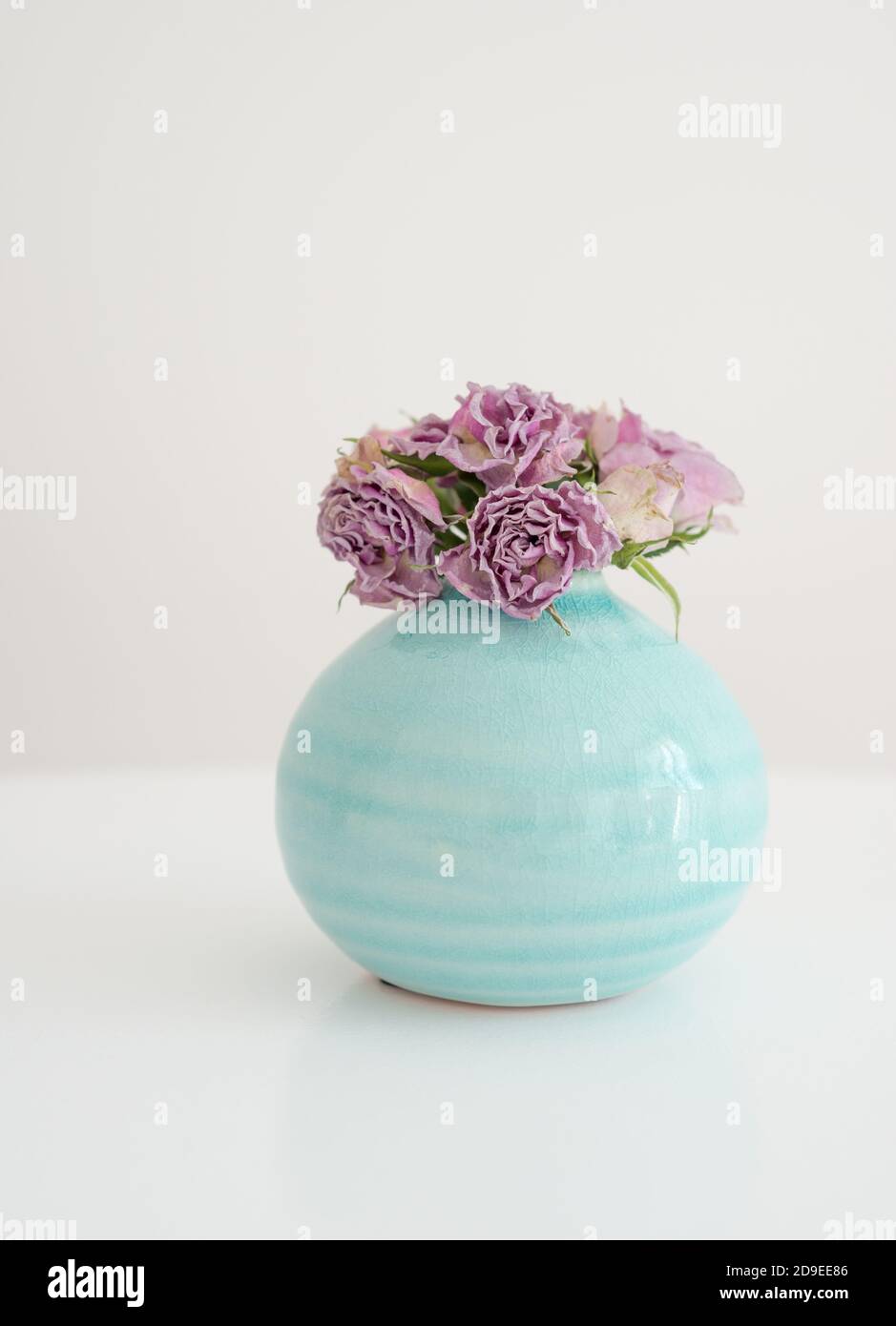 Flowers in a turquoise vase hi-res stock photography and images - Alamy