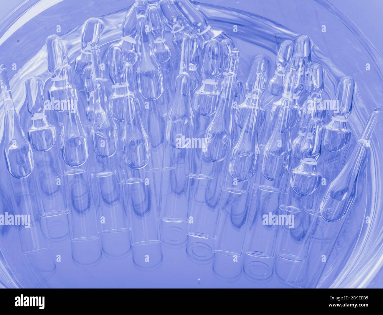 Glass medical ampoule vial for injection. Medicine is liquid sodium ...
