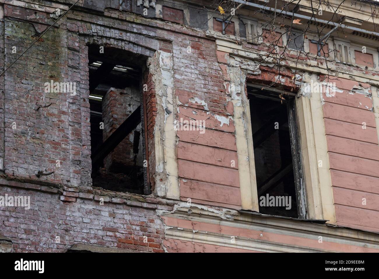 Broken windows in an old abandoned building about to be demolished ...