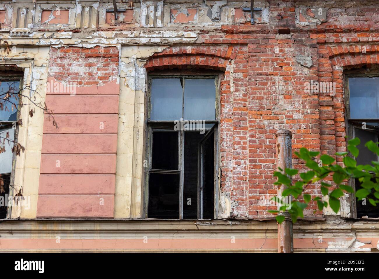 Broken windows in an old abandoned building about to be demolished ...
