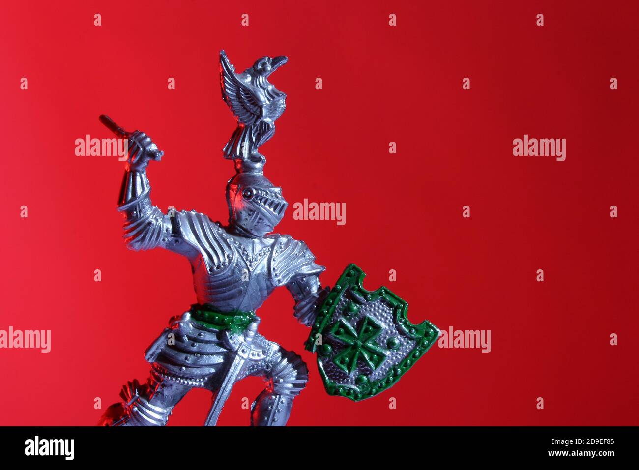 medieval knight toy on red background Stock Photo - Alamy