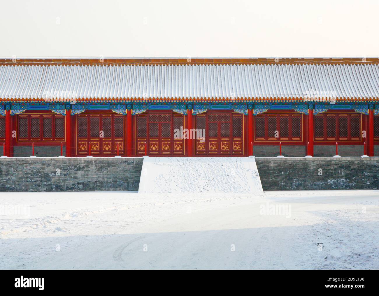 Snow covered red chinese building in Beijing Stock Photo - Alamy