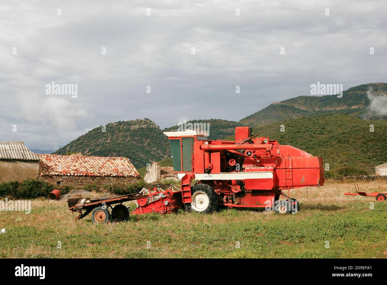 Red tractor. Concept of agricultural machinery Stock Photo - Alamy