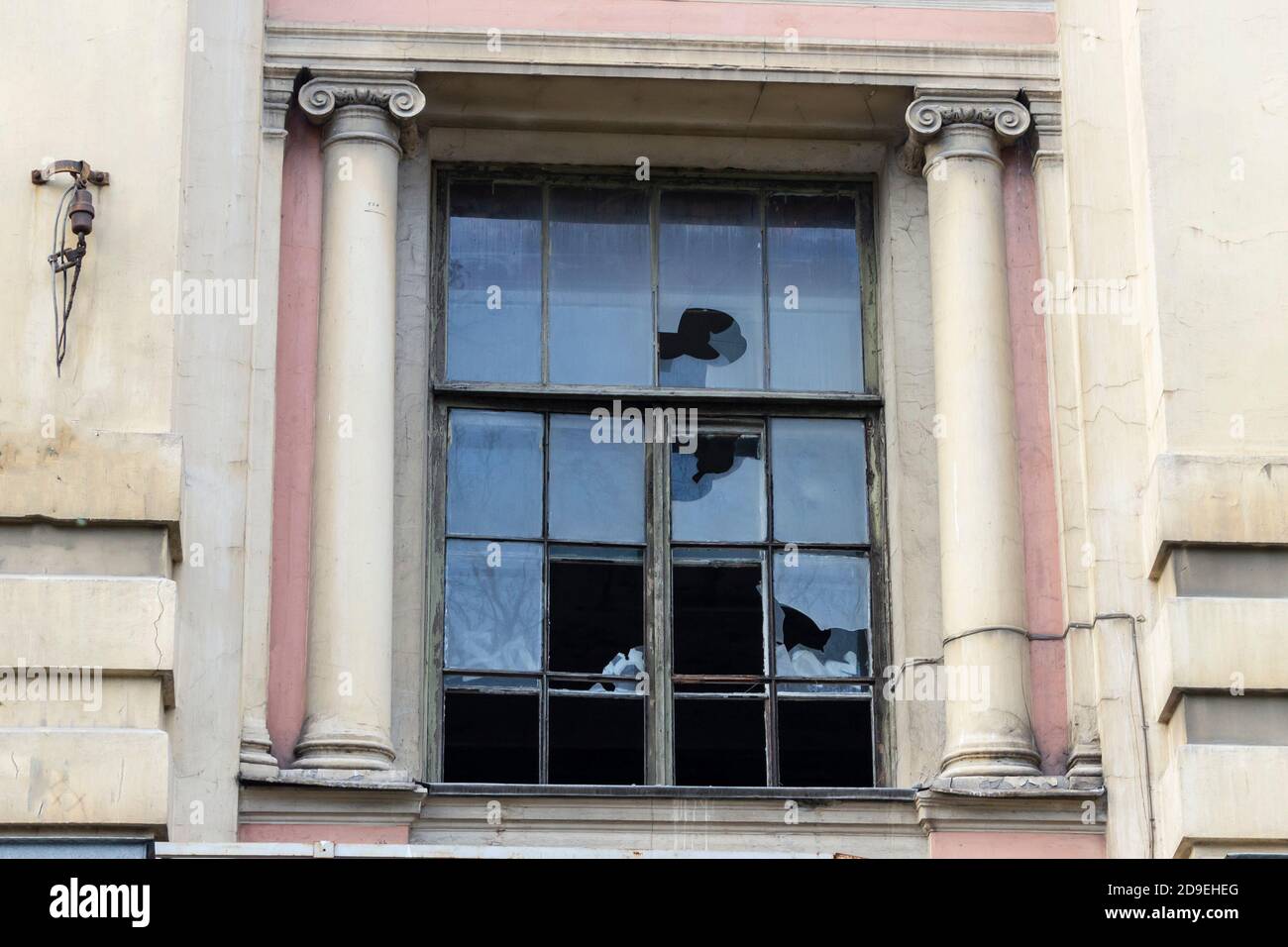 Broken windows in an old abandoned building about to be demolished ...