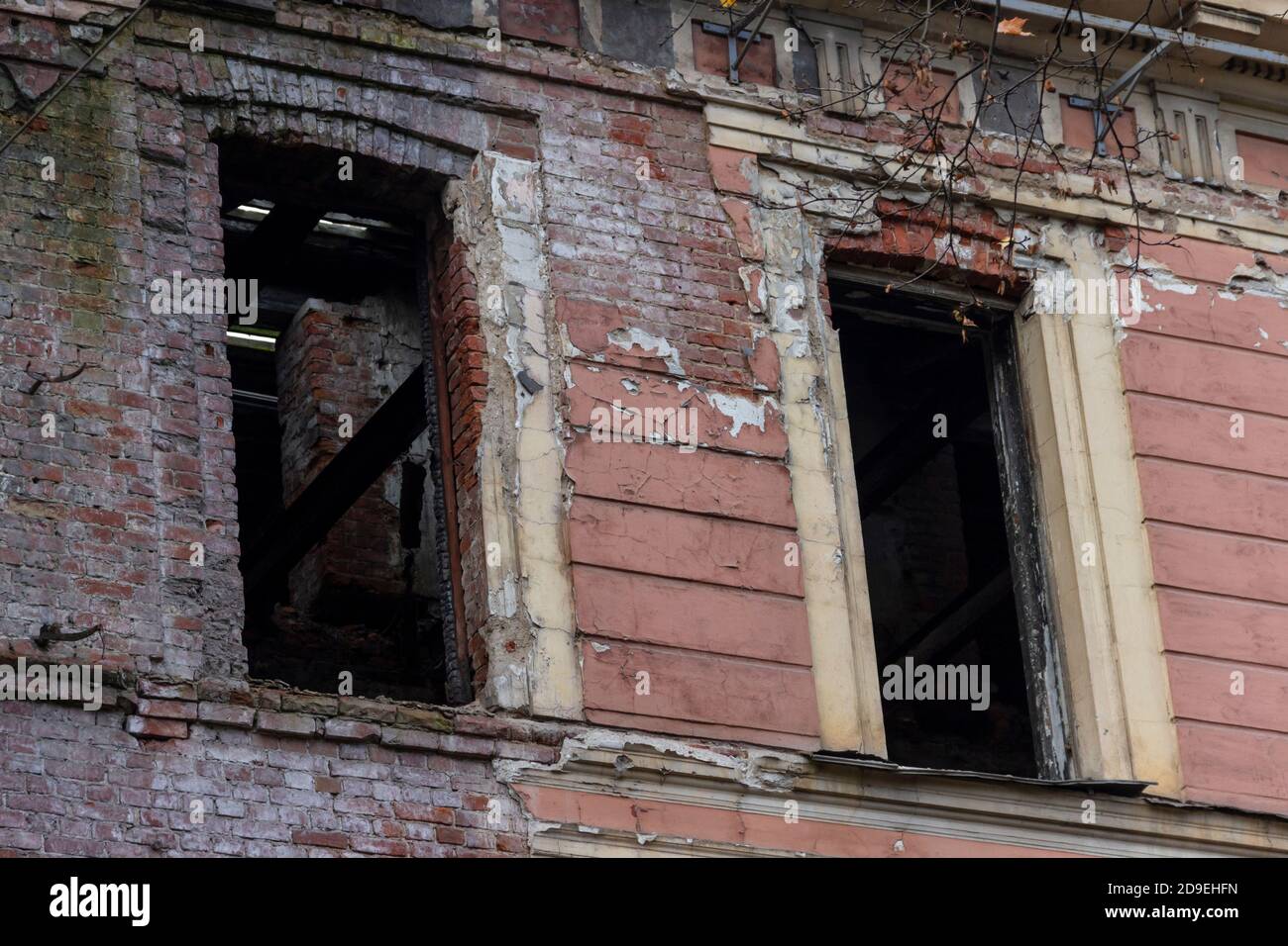 Broken windows in an old abandoned building about to be demolished ...