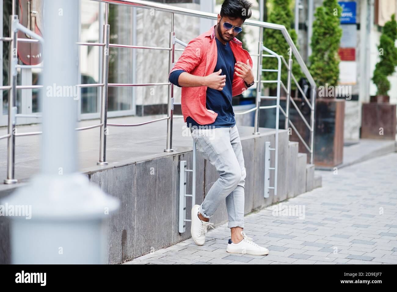 Portrait of young stylish indian man model pose in street in sunglasses Stock Photo - Alamy