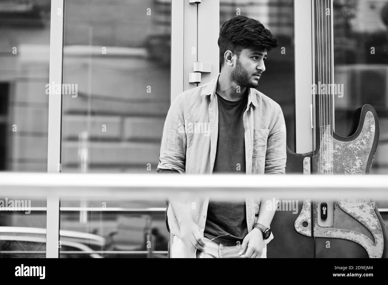 Portrait of young stylish indian man model pose in street Stock Photo ...