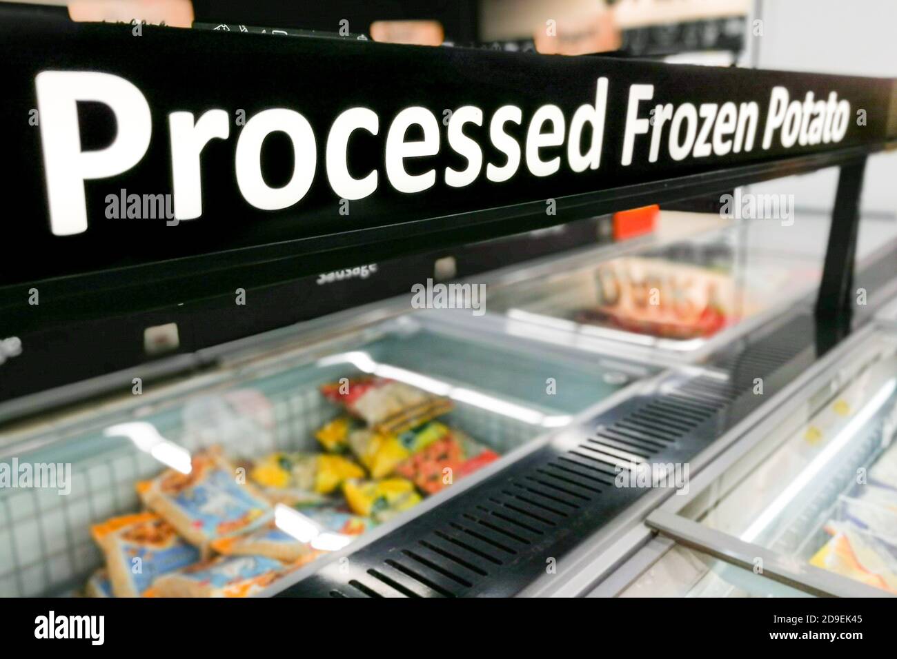 Processed Frozen Potato signage at the fresh refrigerated supermarket ...