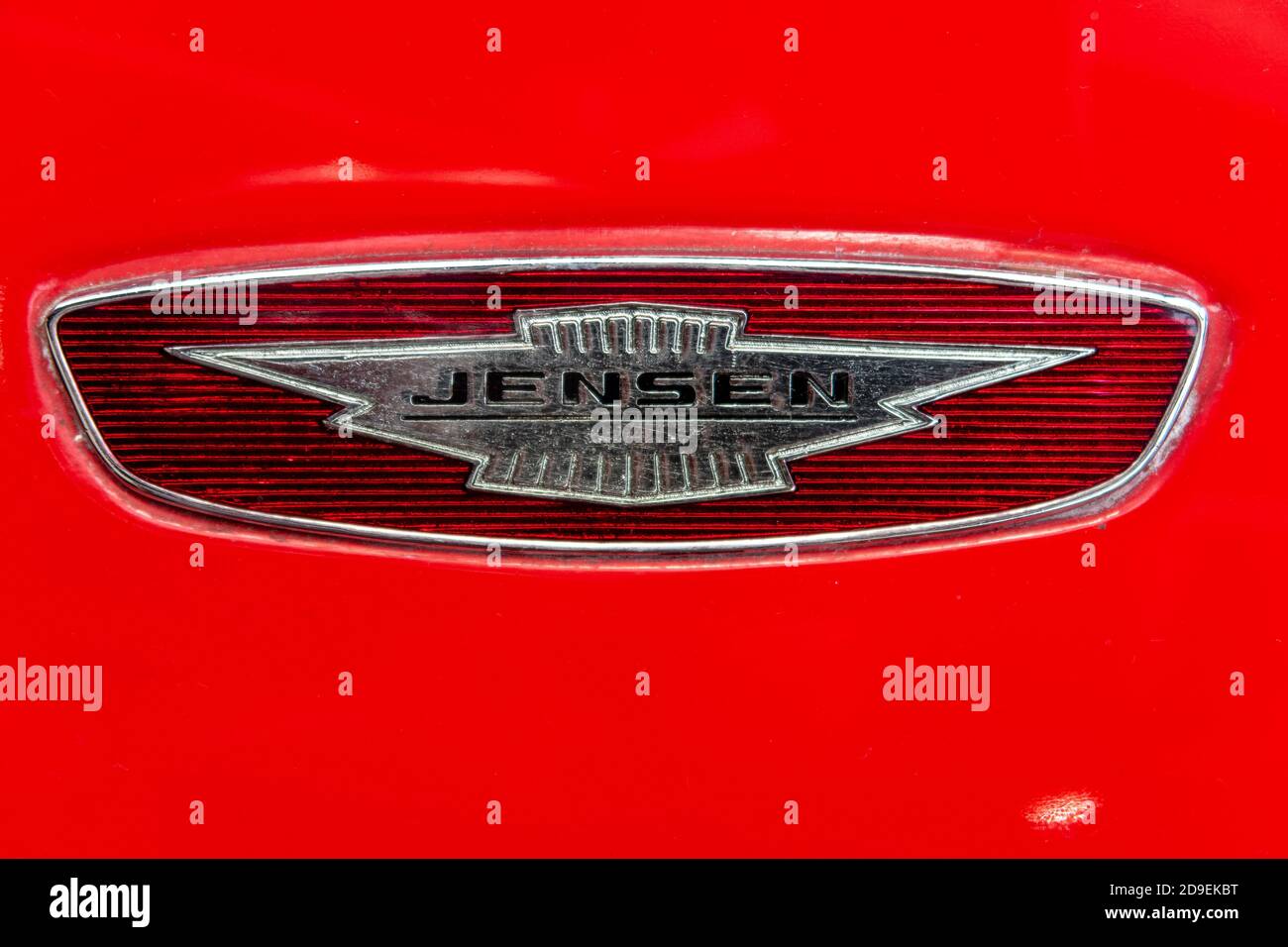 The manufacturer’s badge on a red Jensen Interceptor on display at the ...