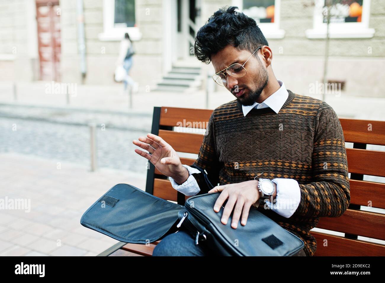 South indian businessman sitting on hi-res stock photography and images - Alamy