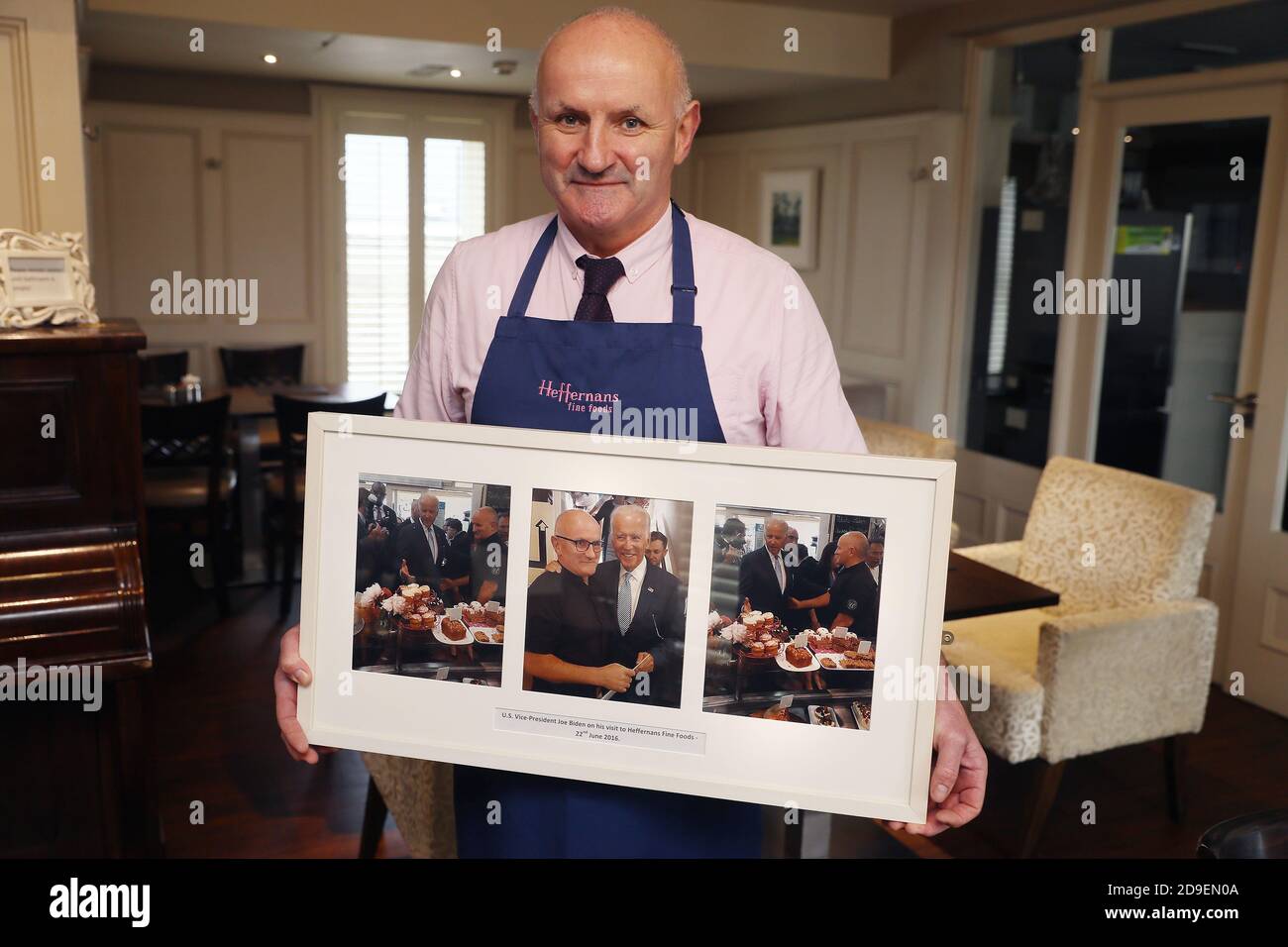 Anthony Heffernan, owner of Heffernan's Fine Foods, with photographs of ...