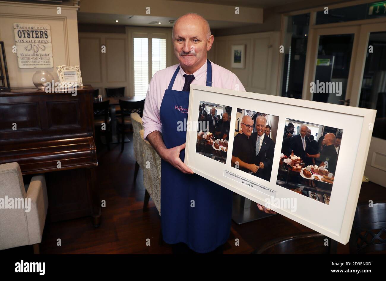 Anthony Heffernan, owner of Heffernan's Fine Foods, with photographs of ...