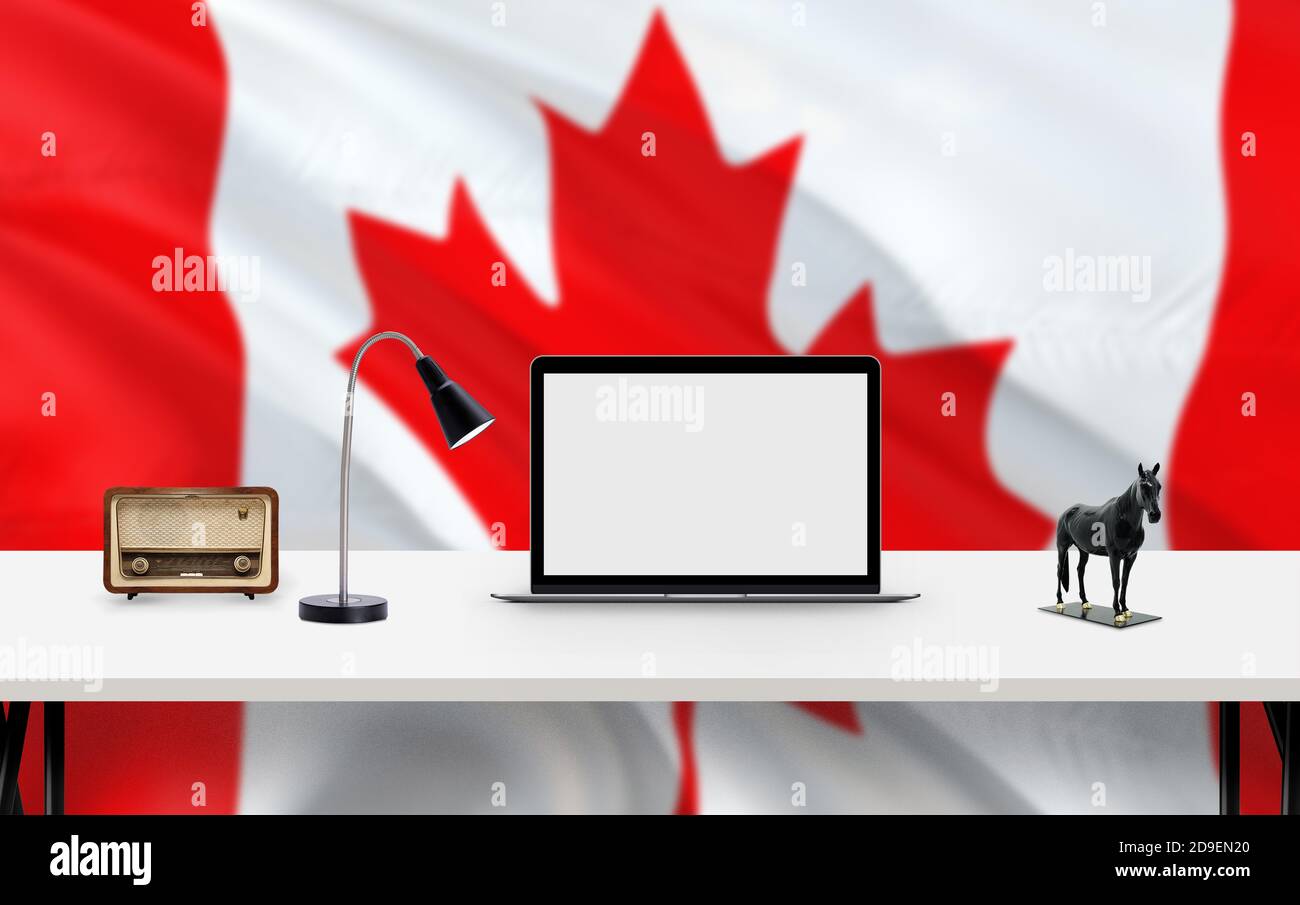 Canada national flag background with workspace, desktop computer and ...