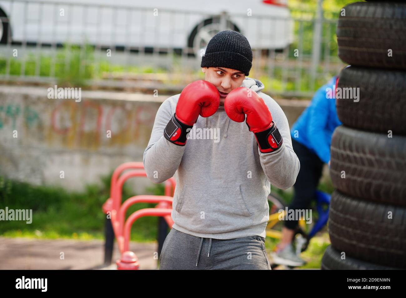 Man arabian boxer in hat training for a hard fight outdoor gym Stock ...