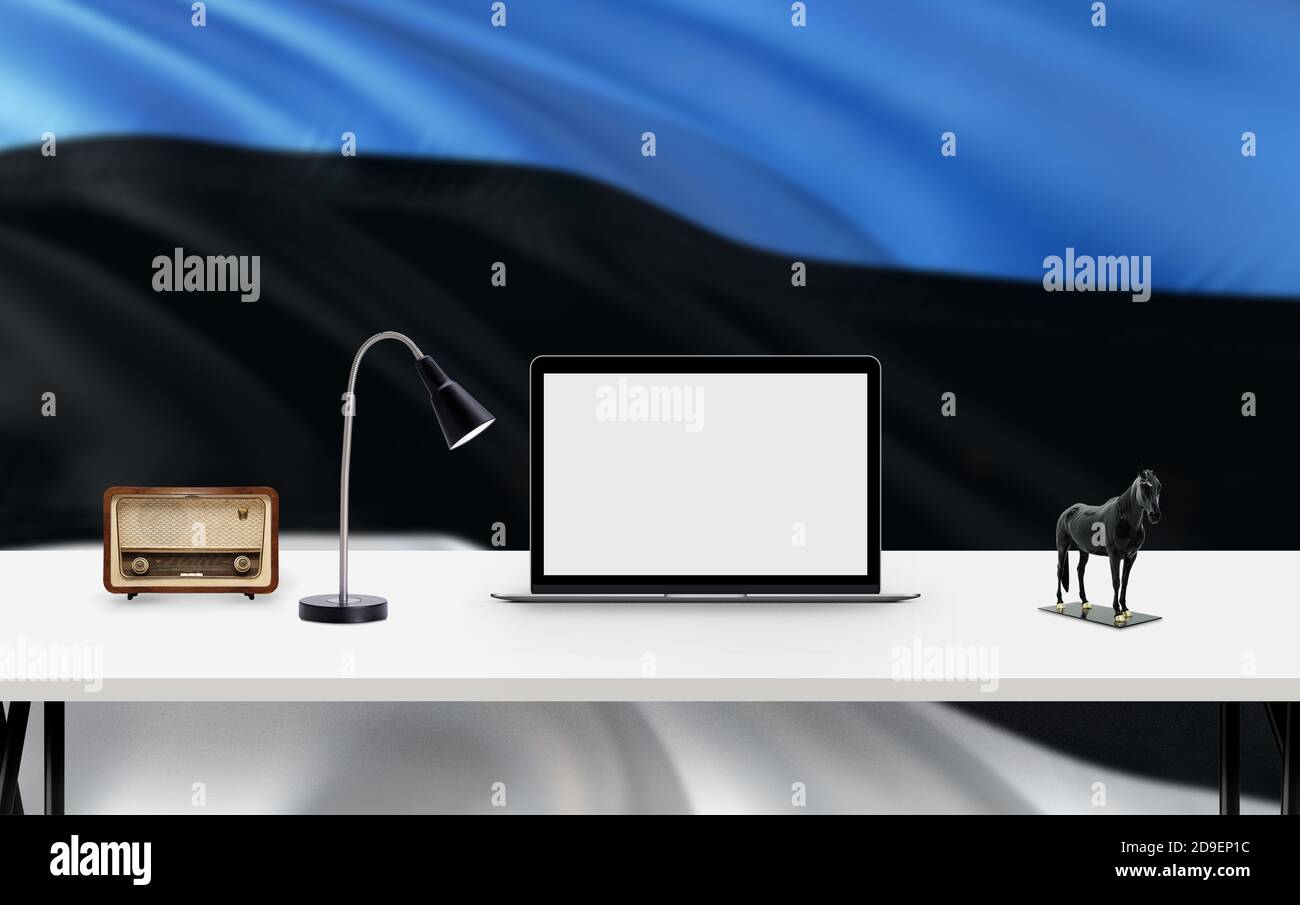 Estonia national flag background with workspace, desktop computer and ...