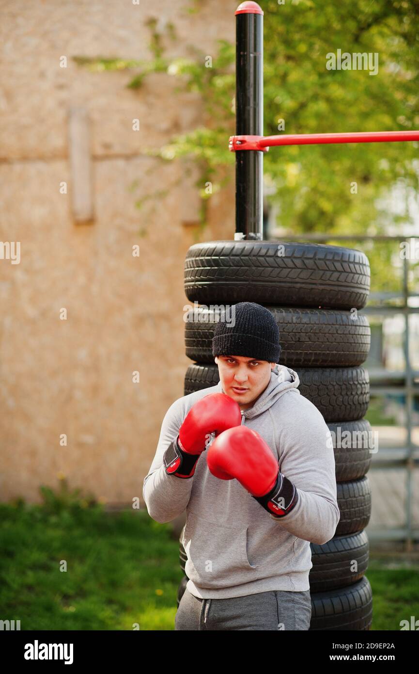 Man arabian boxer in hat training for a hard fight outdoor gym Stock ...