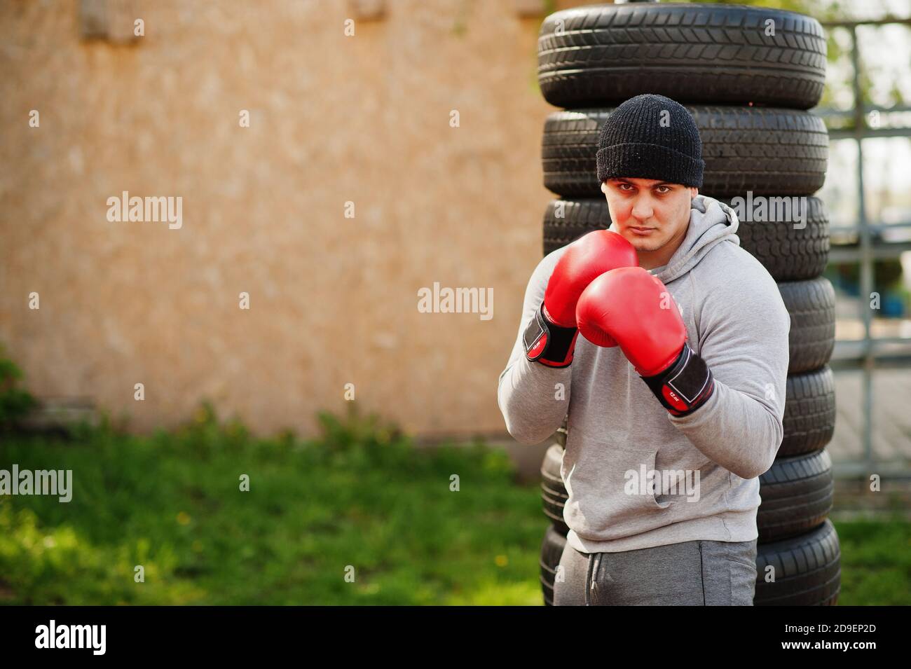 Man arabian boxer in hat training for a hard fight outdoor gym Stock ...