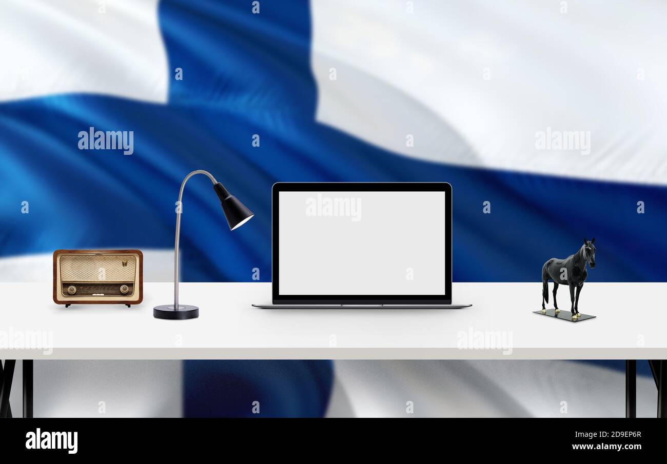 Finland national flag background with workspace, desktop computer and ...