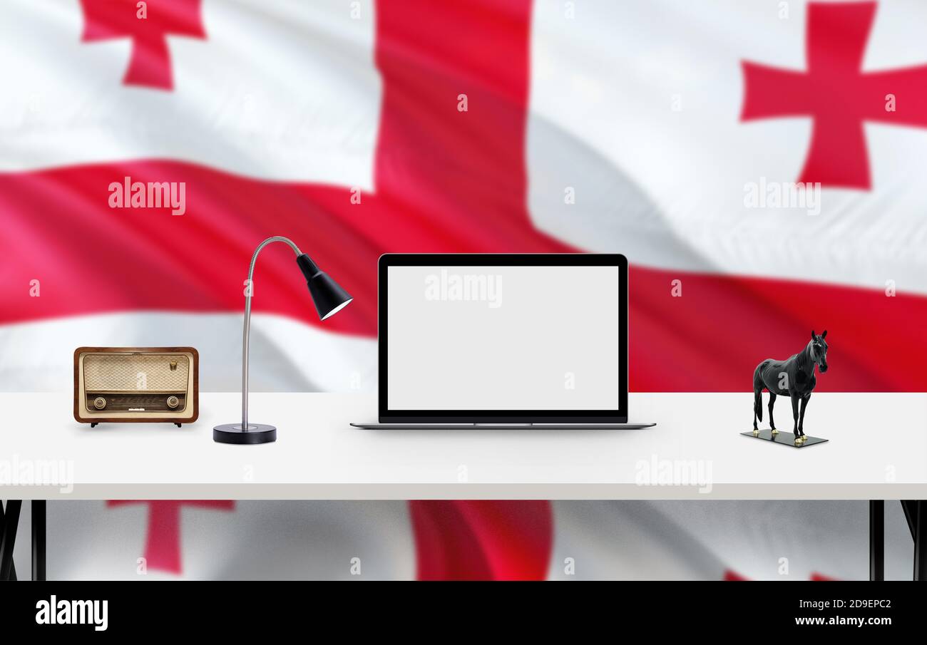 Georgia national flag background with workspace, desktop computer and ...
