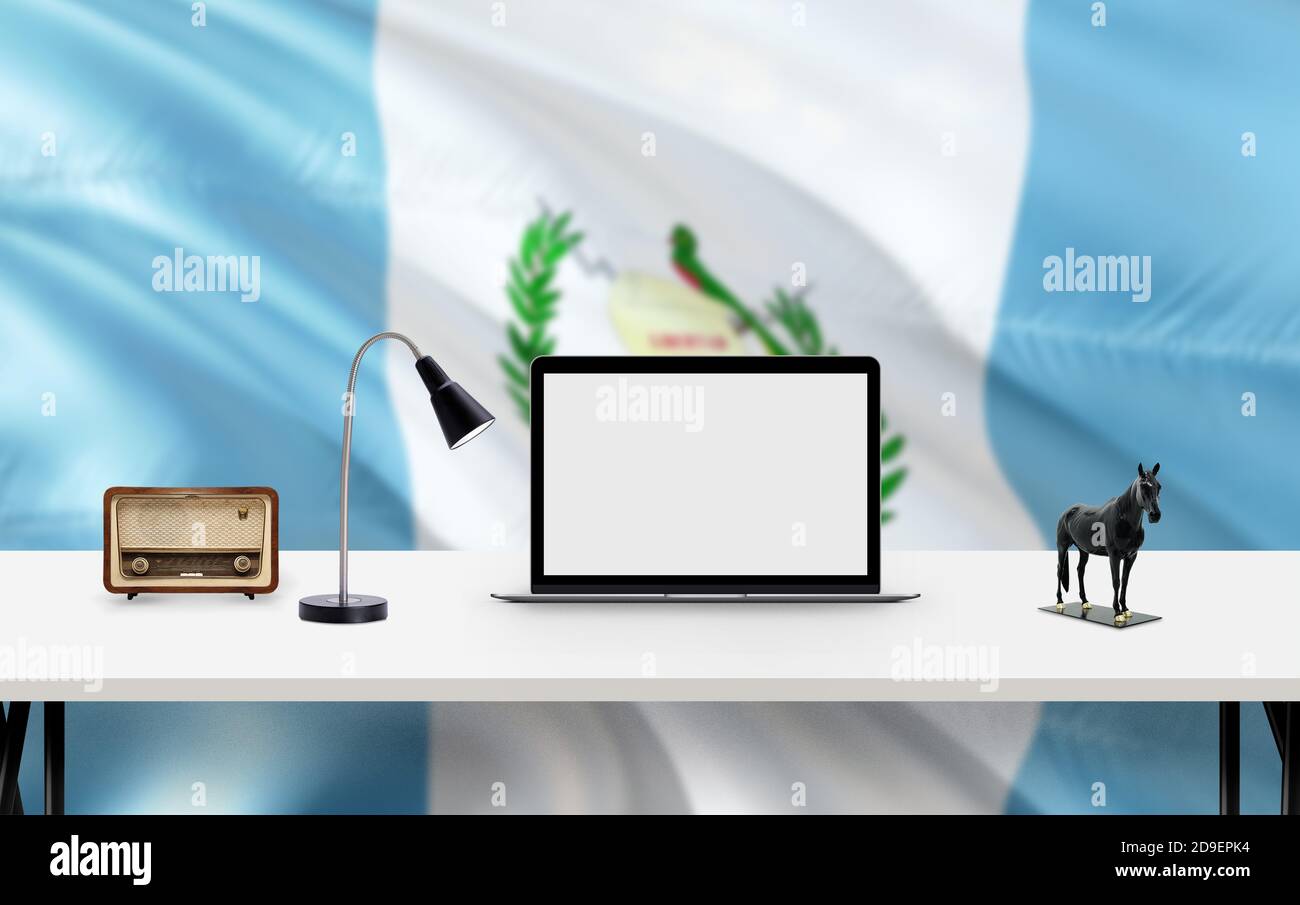Guatemala national flag background with workspace, desktop computer and ...