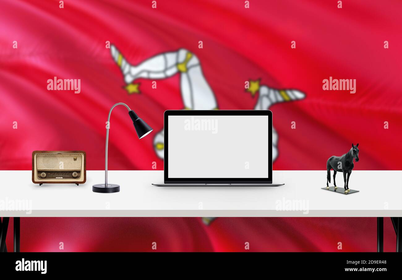 Isle Of Man national flag background with workspace, desktop computer ...
