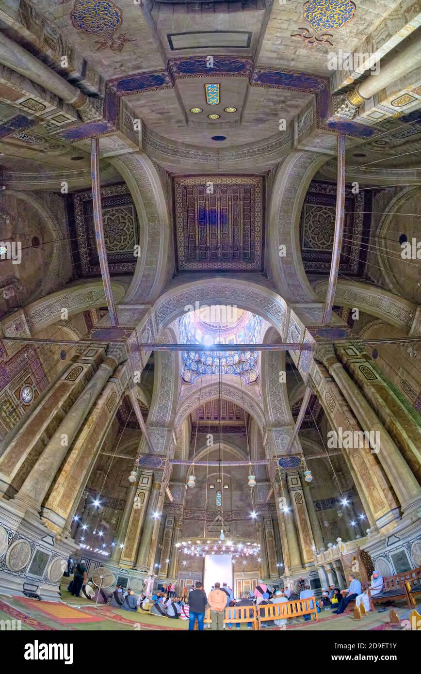 Most of the walls of the mosque are covered with colorful marble with ...