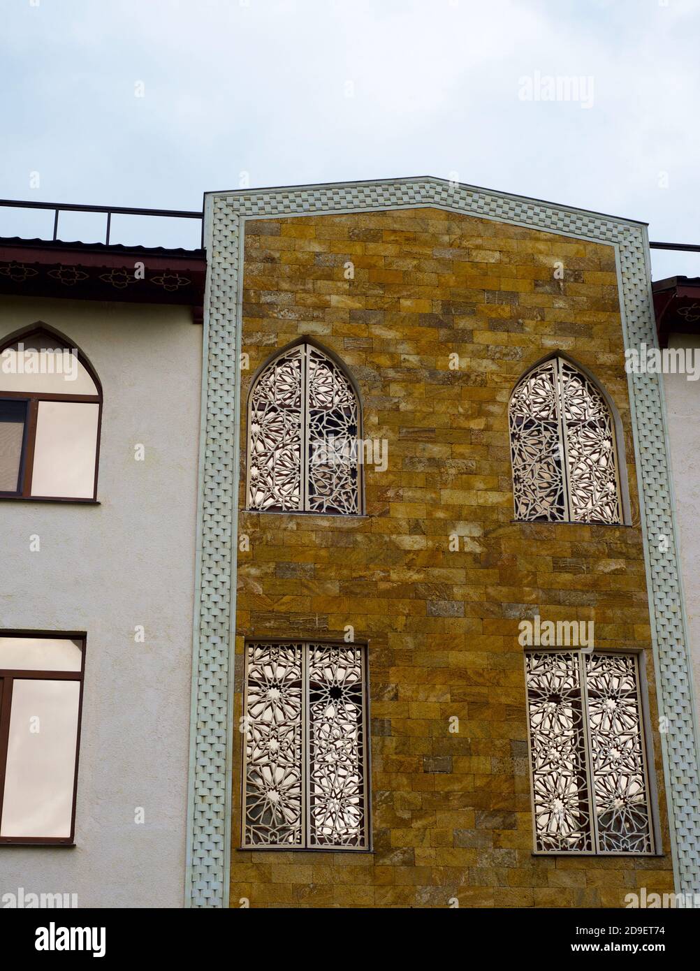 Facade of a modern Muslim building Windows with artistic bars Stock ...