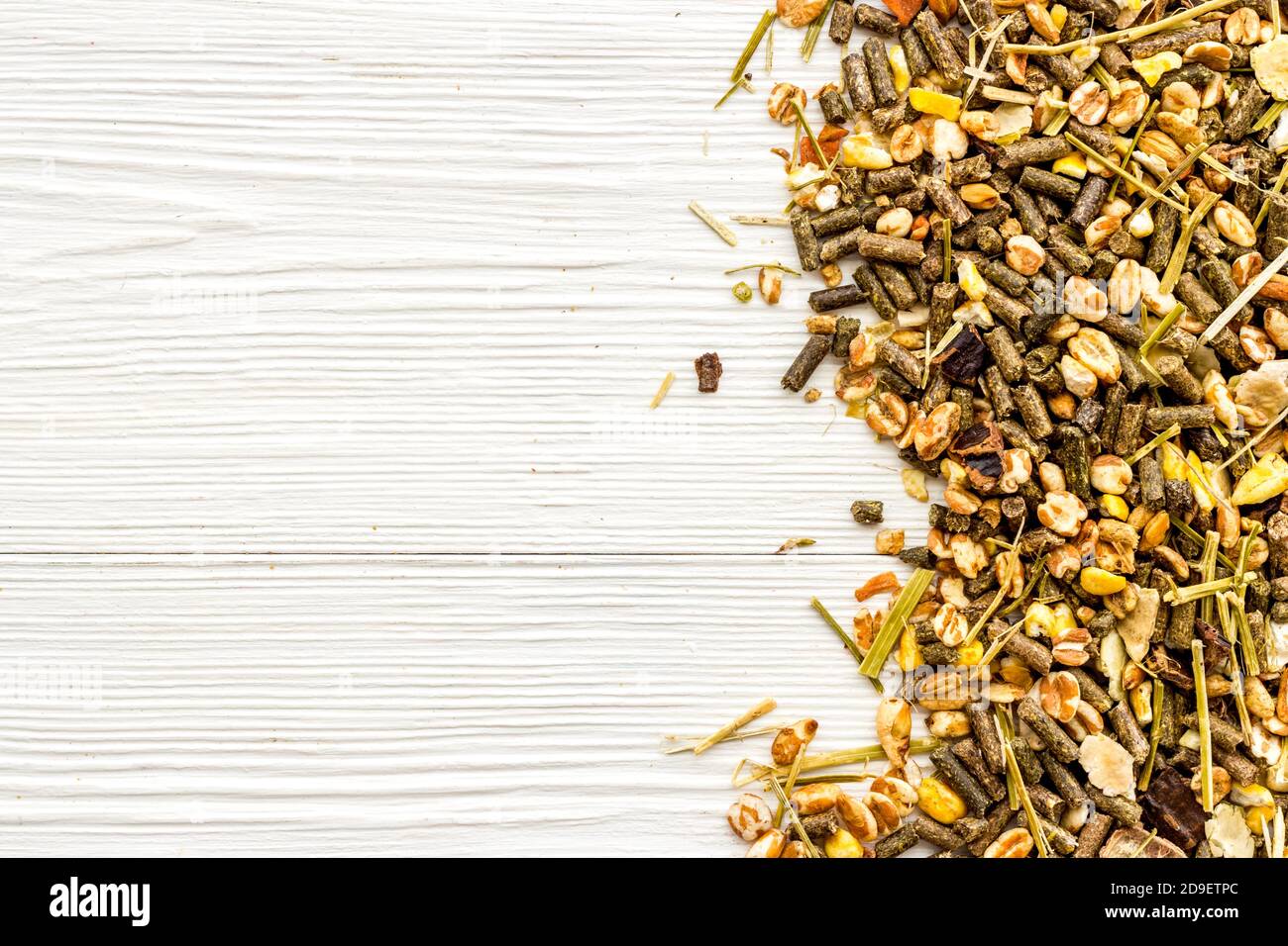 Rodent pet food background. Top, overhead view Stock Photo - Alamy