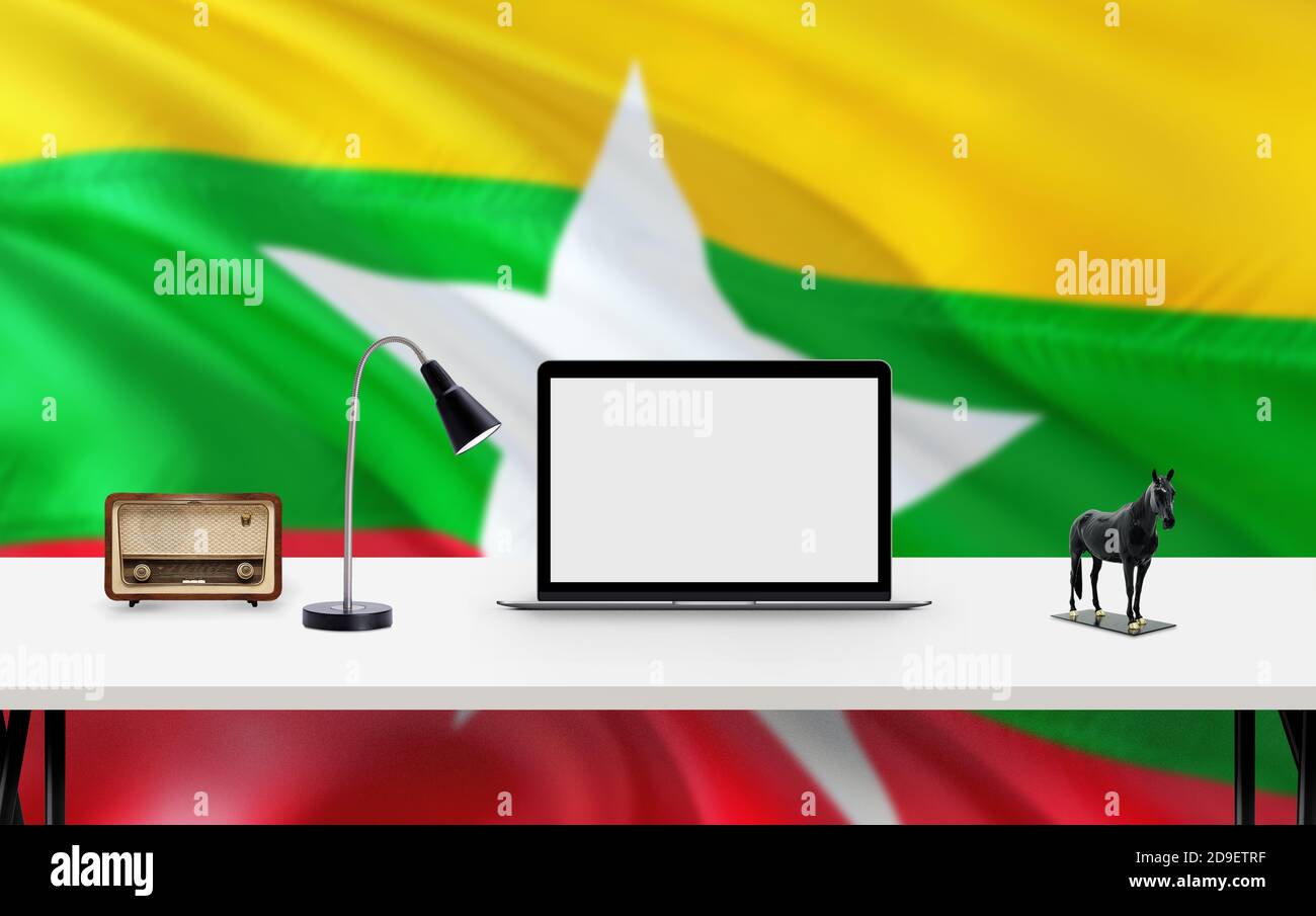 Myanmar national flag background with workspace, desktop computer and ...