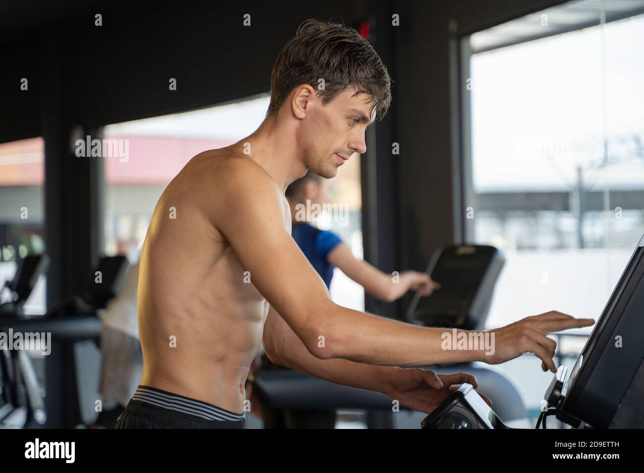 Man running at the gym Stock Photo - Alamy