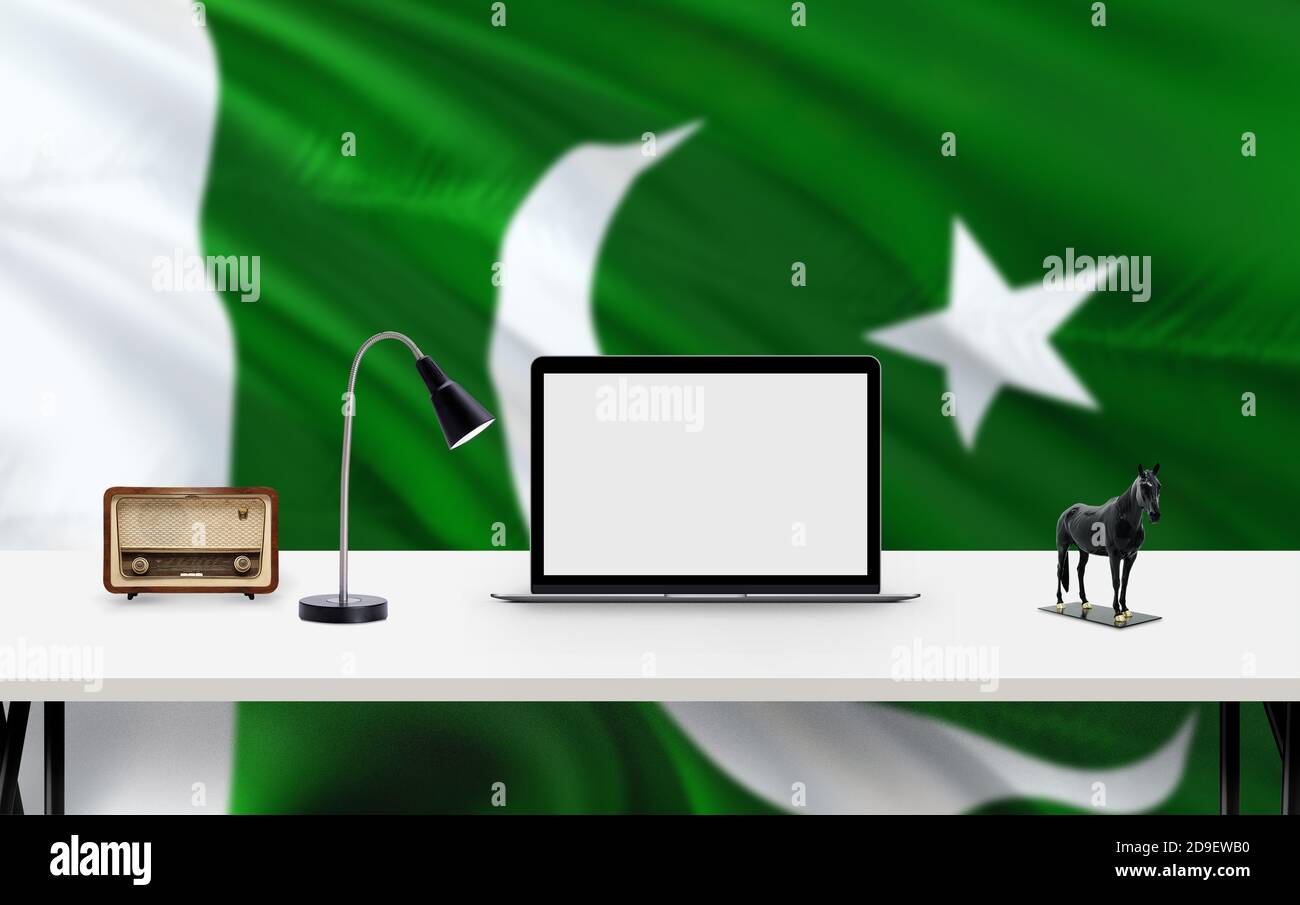 Pakistan national flag background with workspace, desktop computer and ...