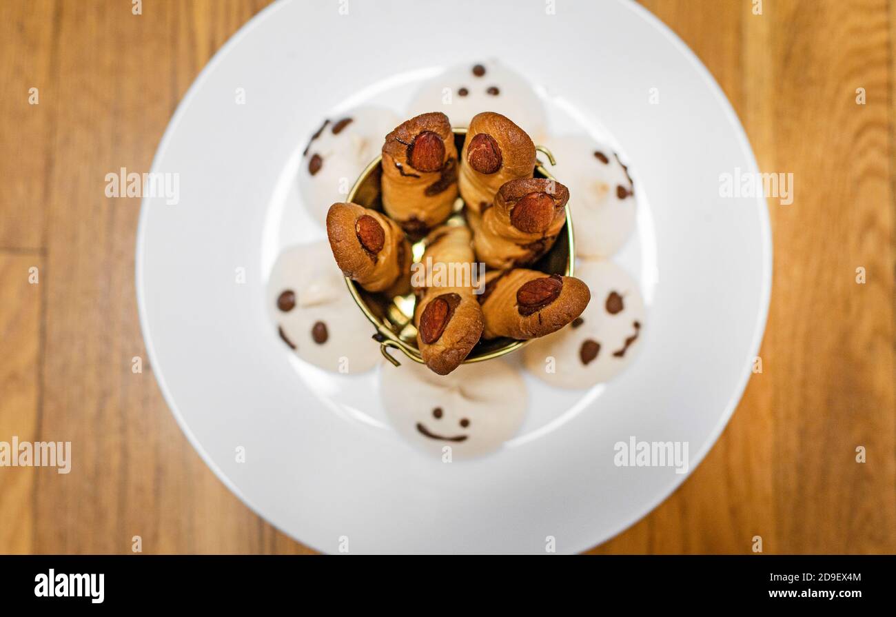 Scary finger-shaped almond shortbread cookies and Ghost style meringue ...
