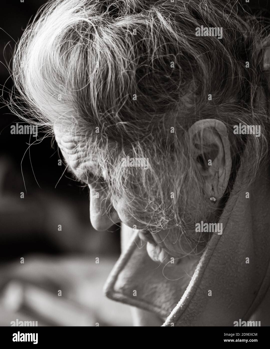 Old age concept. Portrait of a very old and tired of life wrinkled ...