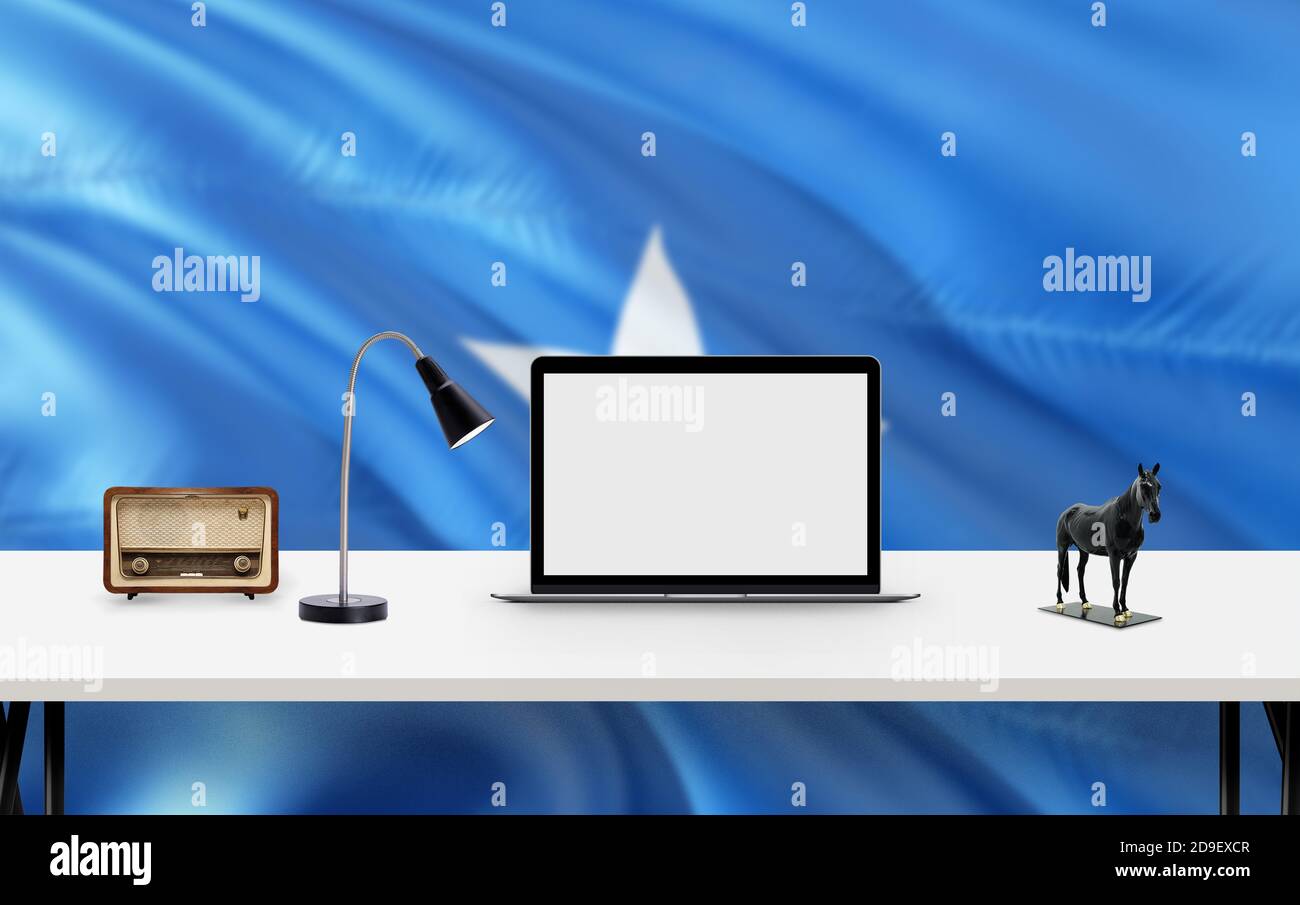 Somalia national flag background with workspace, desktop computer and ...