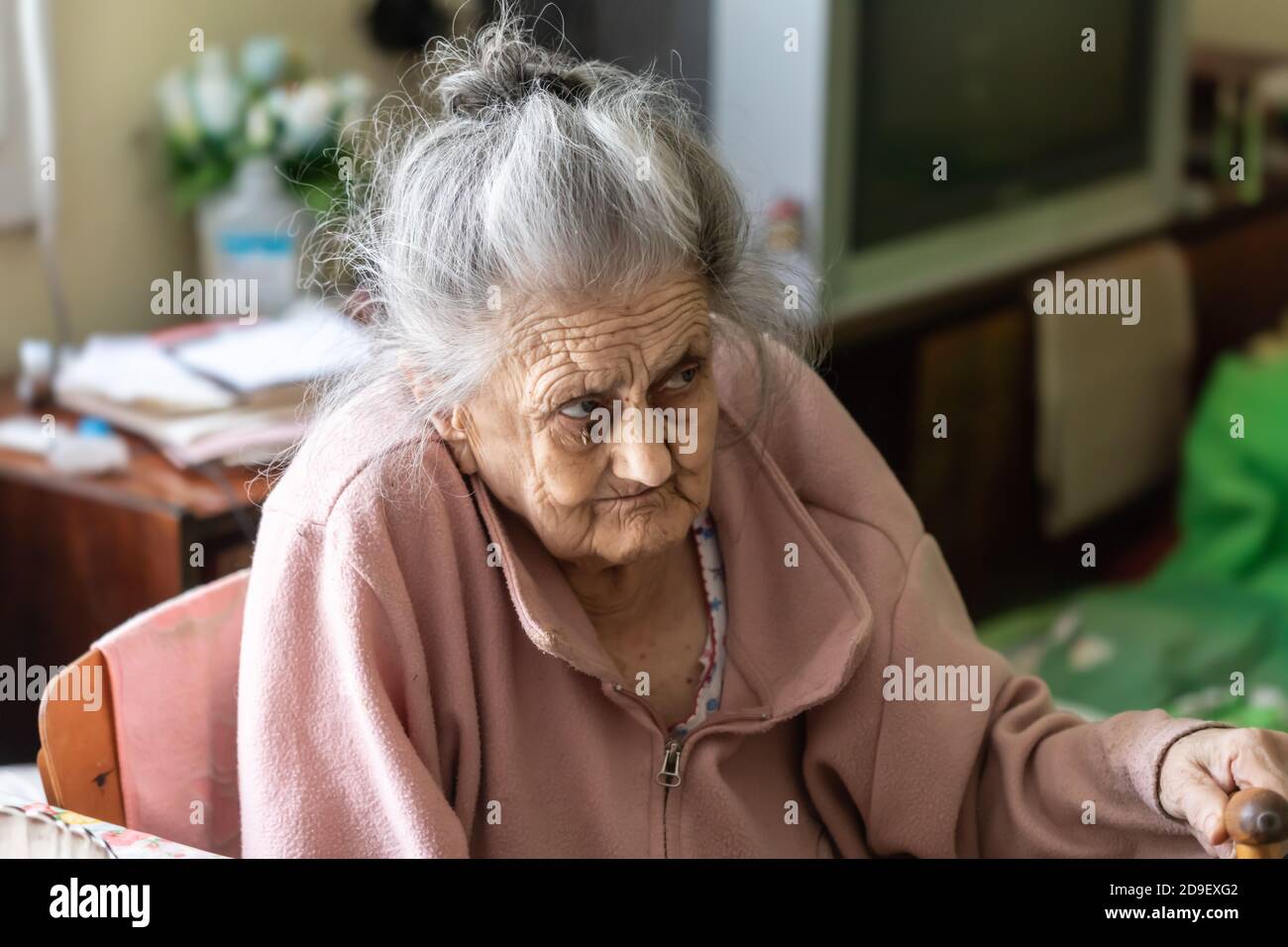Old age concept. Portrait of a very old and tired of life wrinkled ...