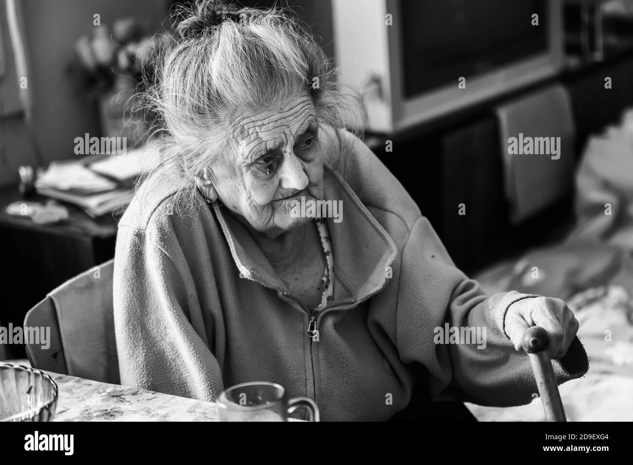 Old age concept. Portrait of a very old and tired of life wrinkled ...