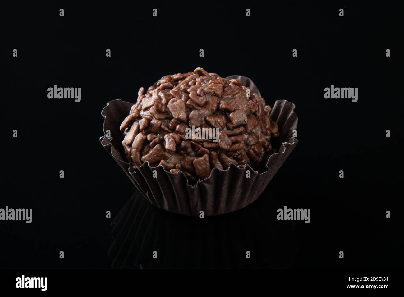 Typical brazilian brigadeiro isolated on black background Stock Photo ...