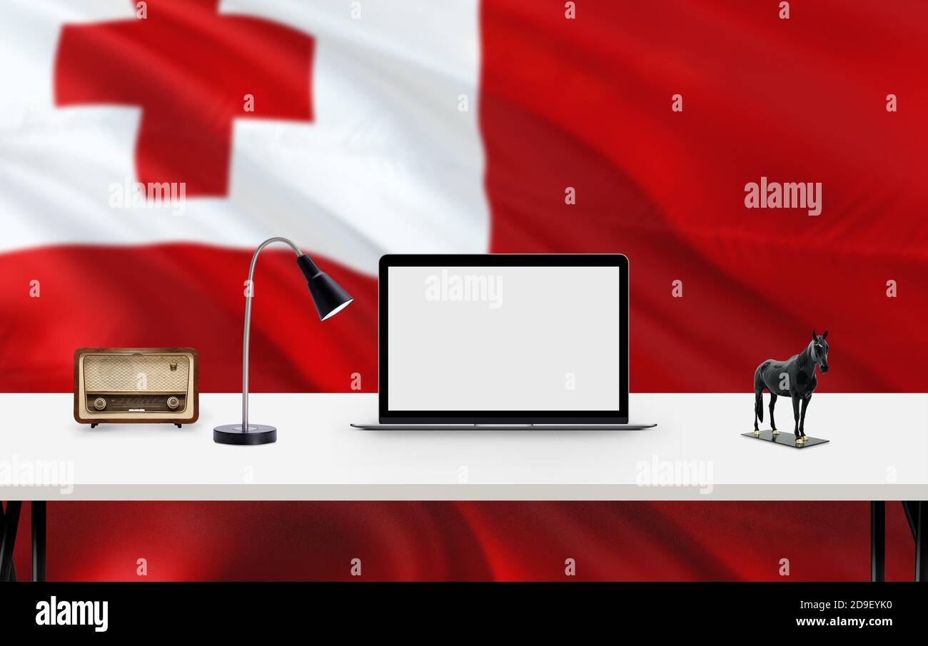 Tonga national flag background with workspace, desktop computer and ...