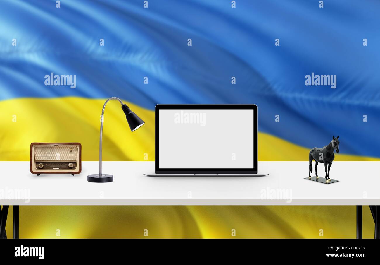 Ukraine national flag background with workspace, desktop computer and ...