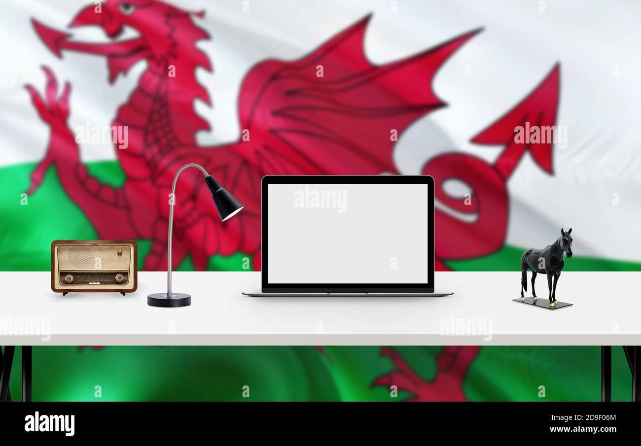 Wales national flag background with workspace, desktop computer and ...