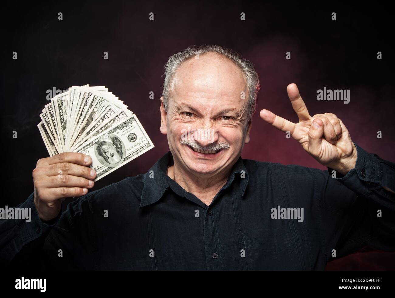 Lucky Old Man Holding With Pleasure Group Of Dollar Bills Focus On