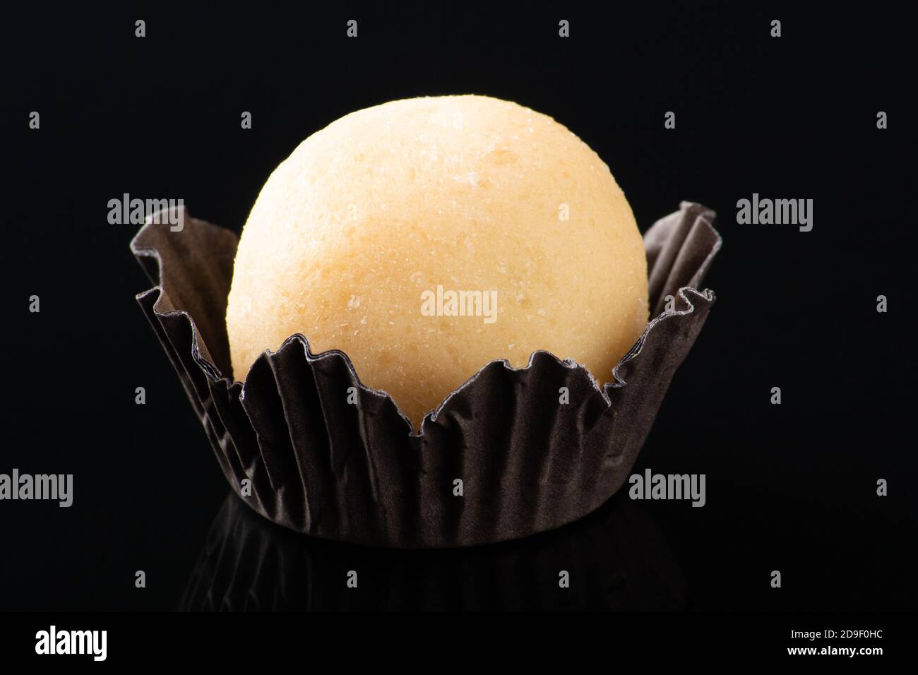 Traditional Brazilian sweet. Party candy isolated on black background ...