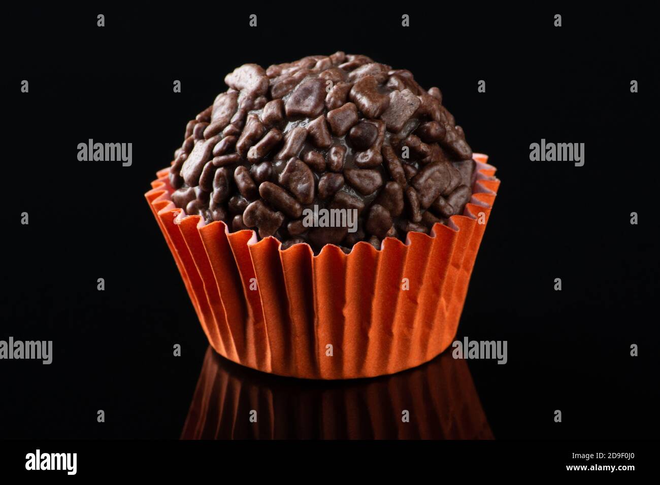 Typical brazilian brigadeiro isolated on black background Stock Photo ...