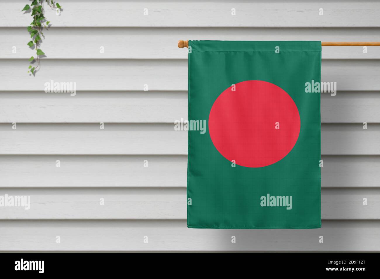 Bangladesh national small flag hangs from a picket fence along the ...